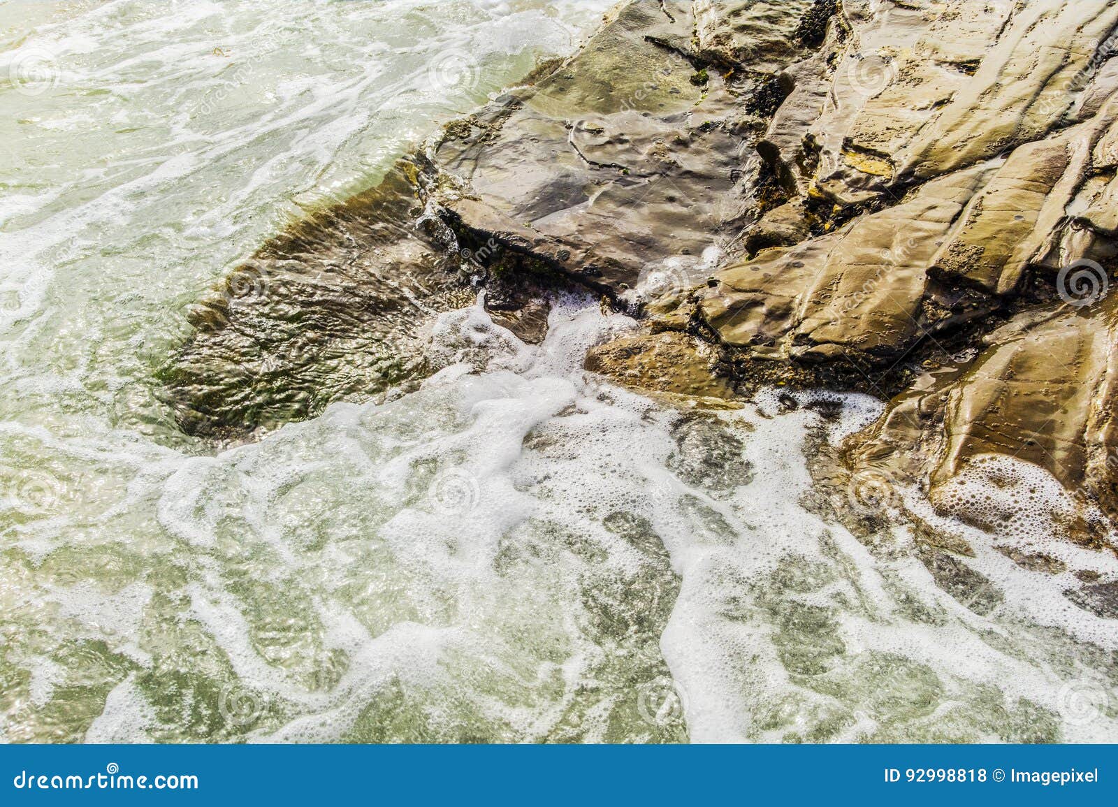 Rocks in shallow water. stock photo. Image of object - 92998818