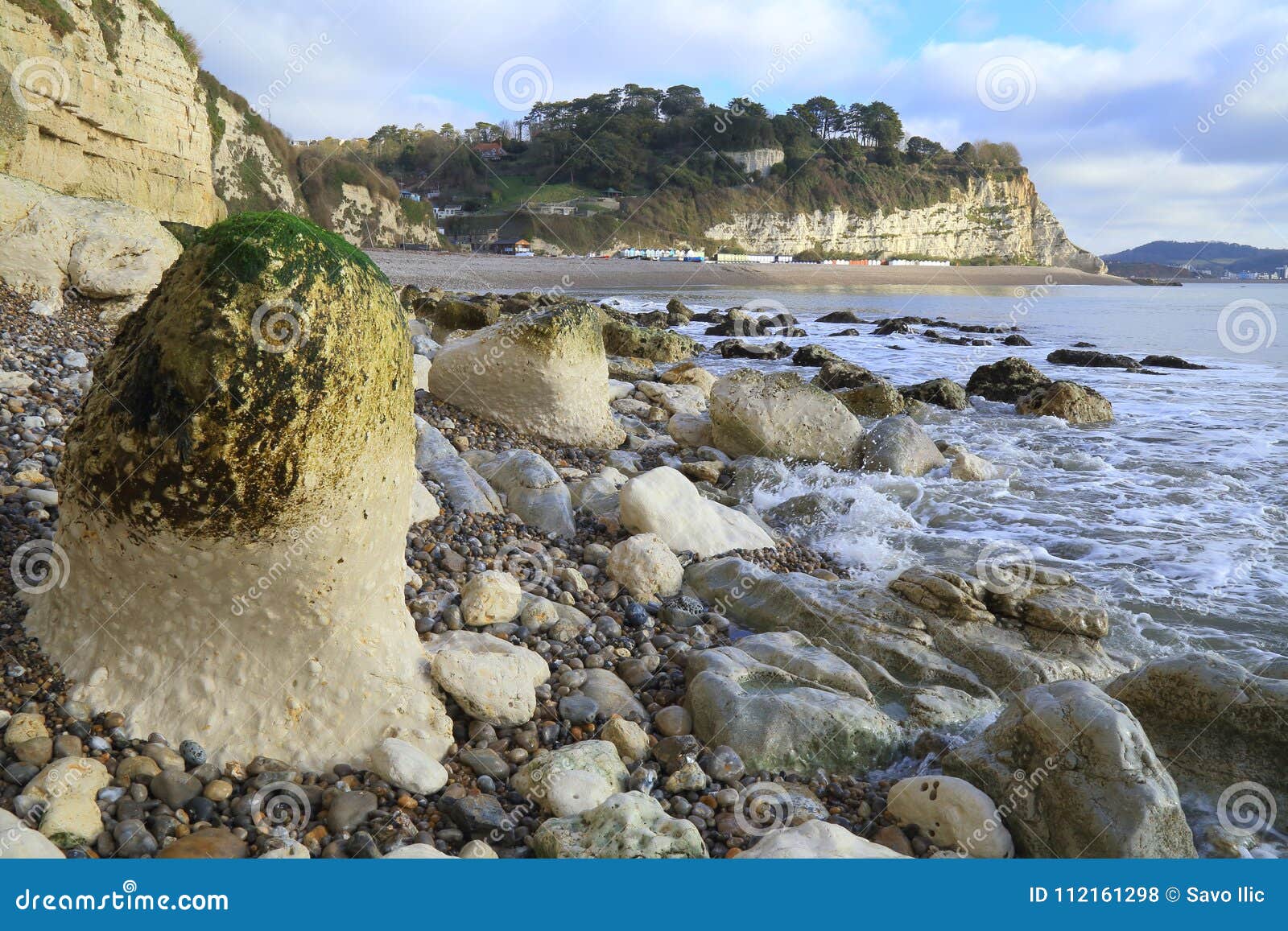 Rocks on the shingle beach stock photo. Image of england - 112161298