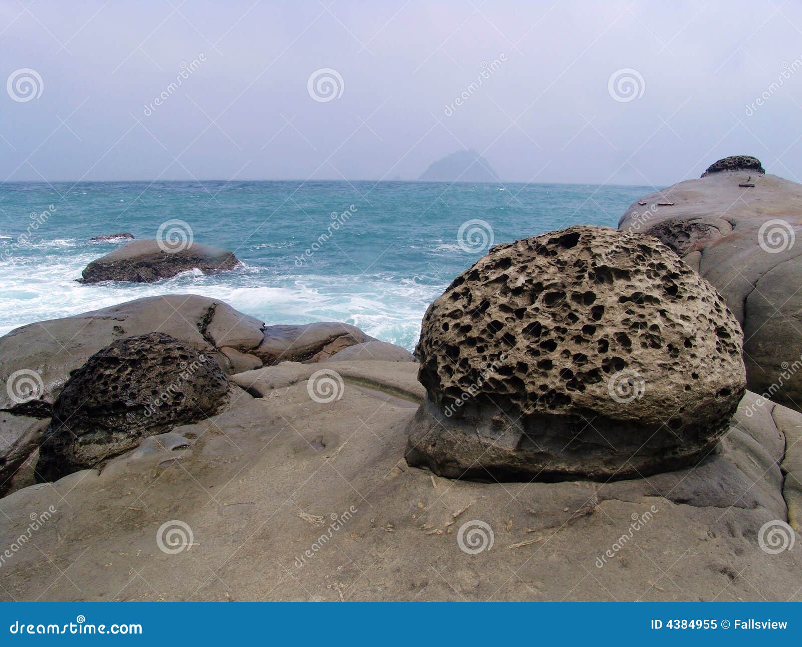 Rocks on shoreline stock image. Image of nature, oceanfront - 4384955
