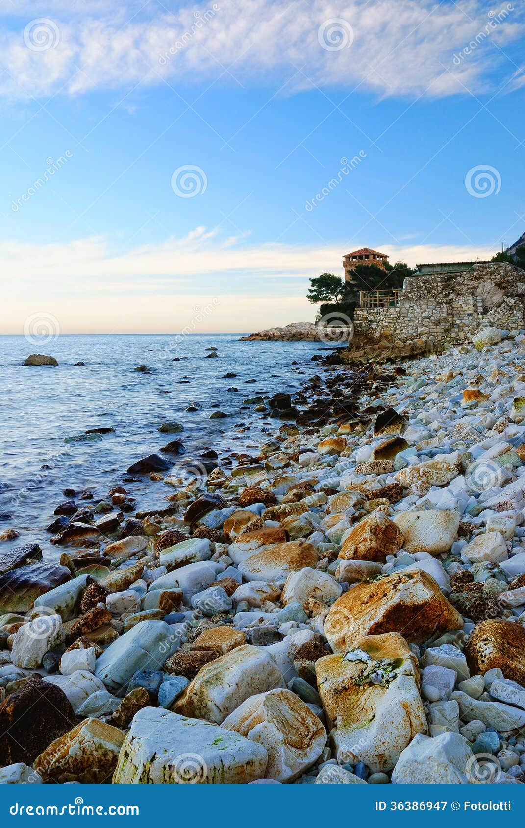 Rocks on the shoreline stock image. Image of landscape - 36386947