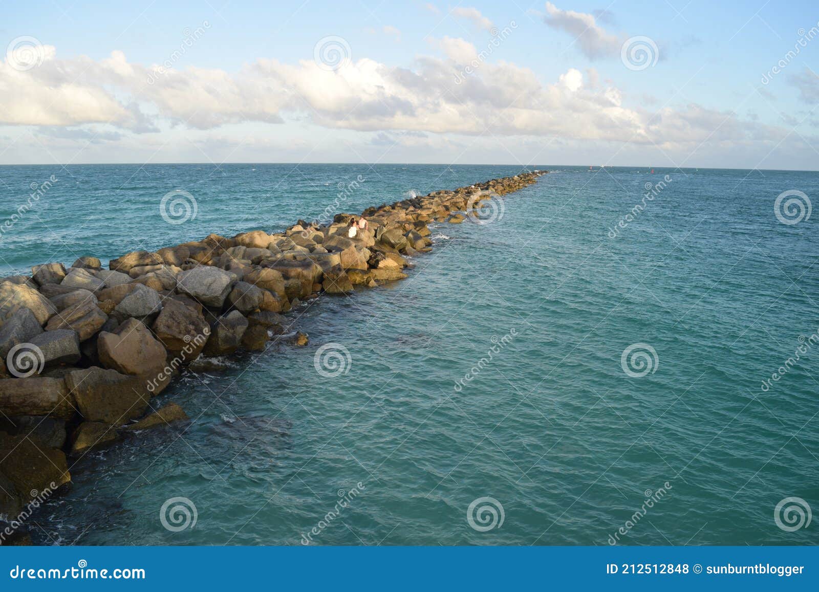 Rocks at south beach Miami stock photo. Image of pier - 212512848