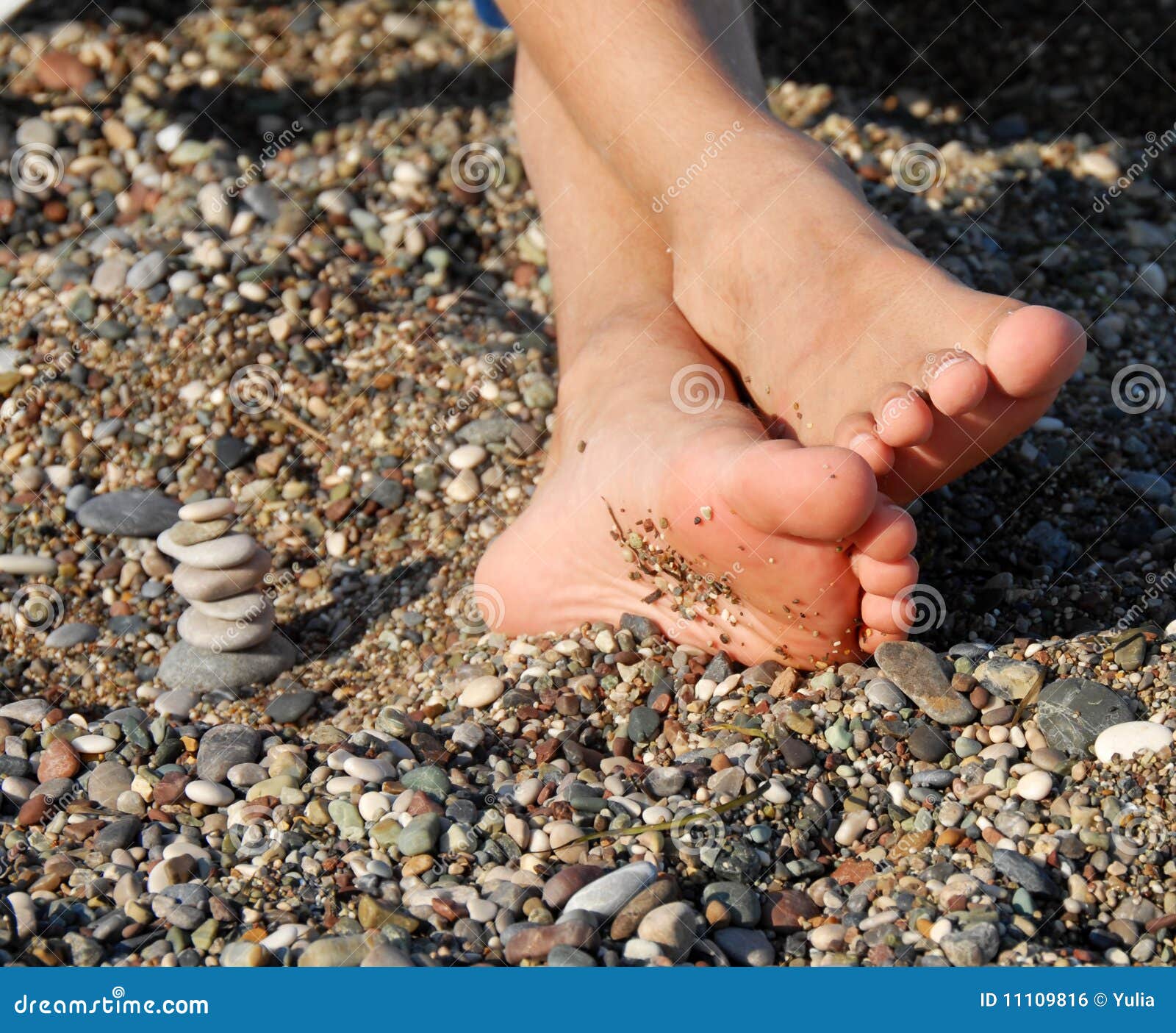 Rocks stack and boy feet stock photo. Image of feet, enjoy - 11109816