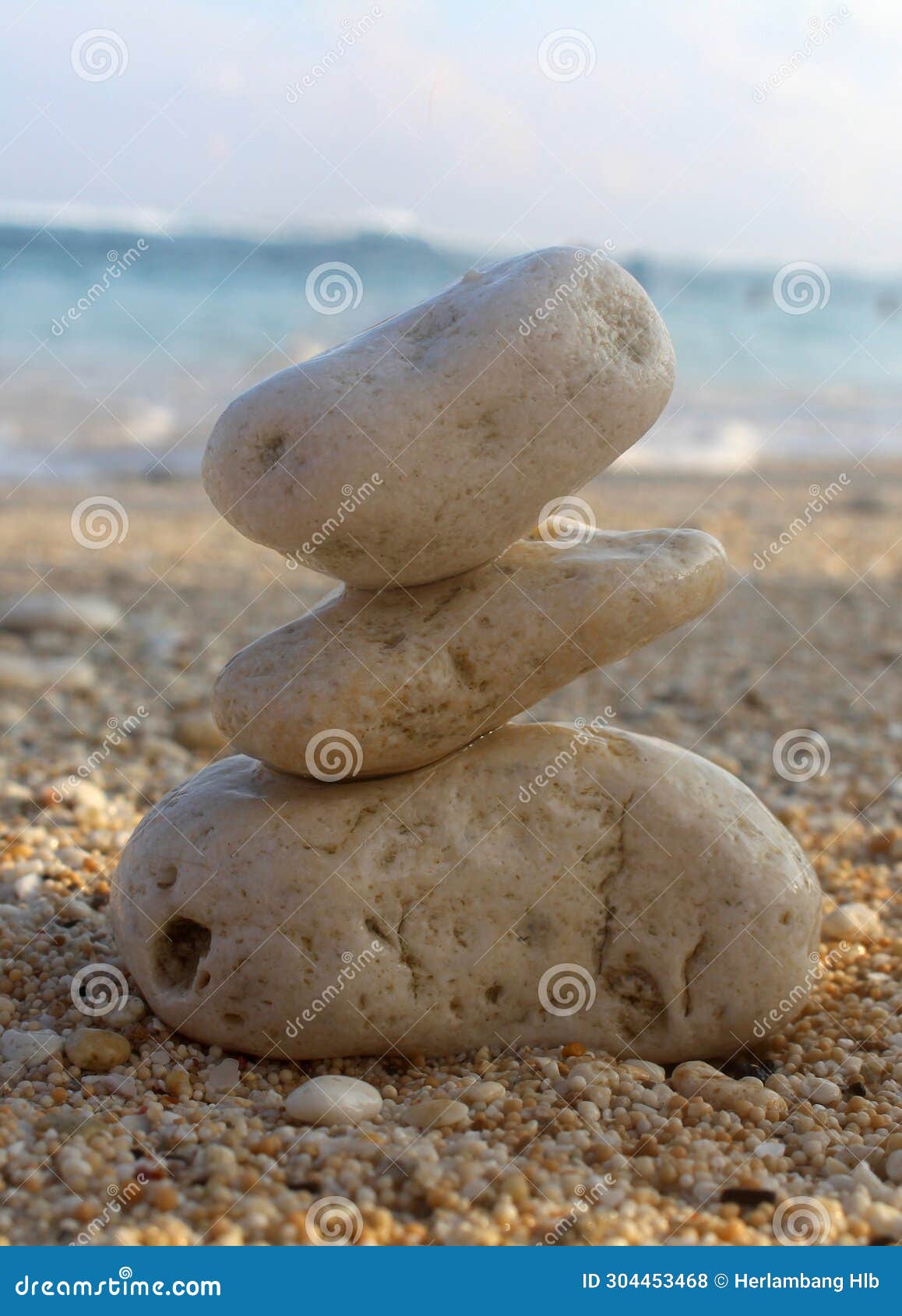 Rocks Stack on Sandy Beach stock photo. Image of rocks - 304453468