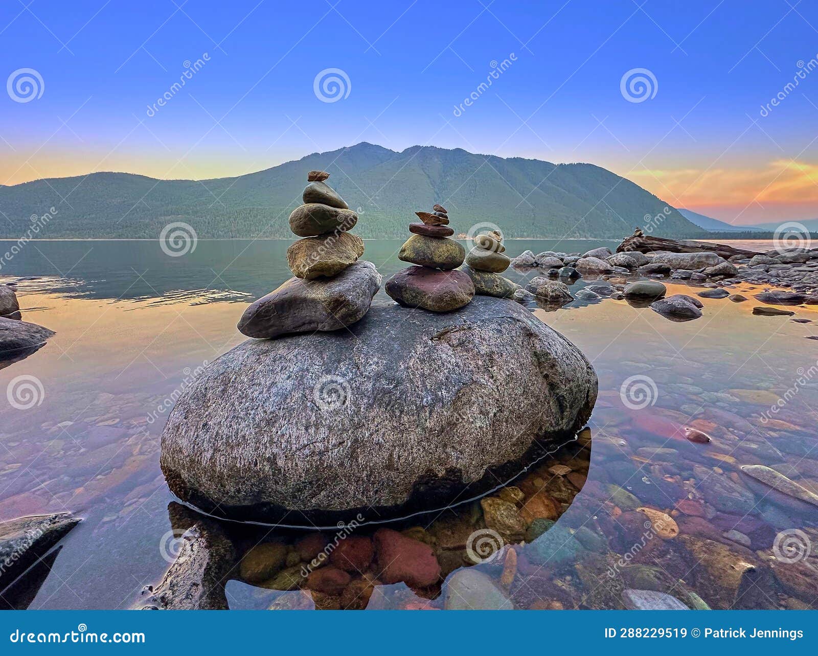 Rocks Stacked on a Large Boulder at Glacier National Park, MT Stock ...