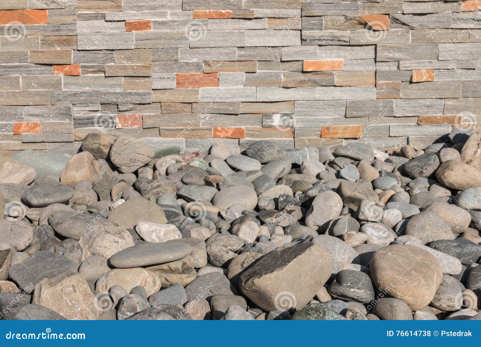Rocks with Stone Veneer Wall Stock Photo - Image of brown, grey: 76614738
