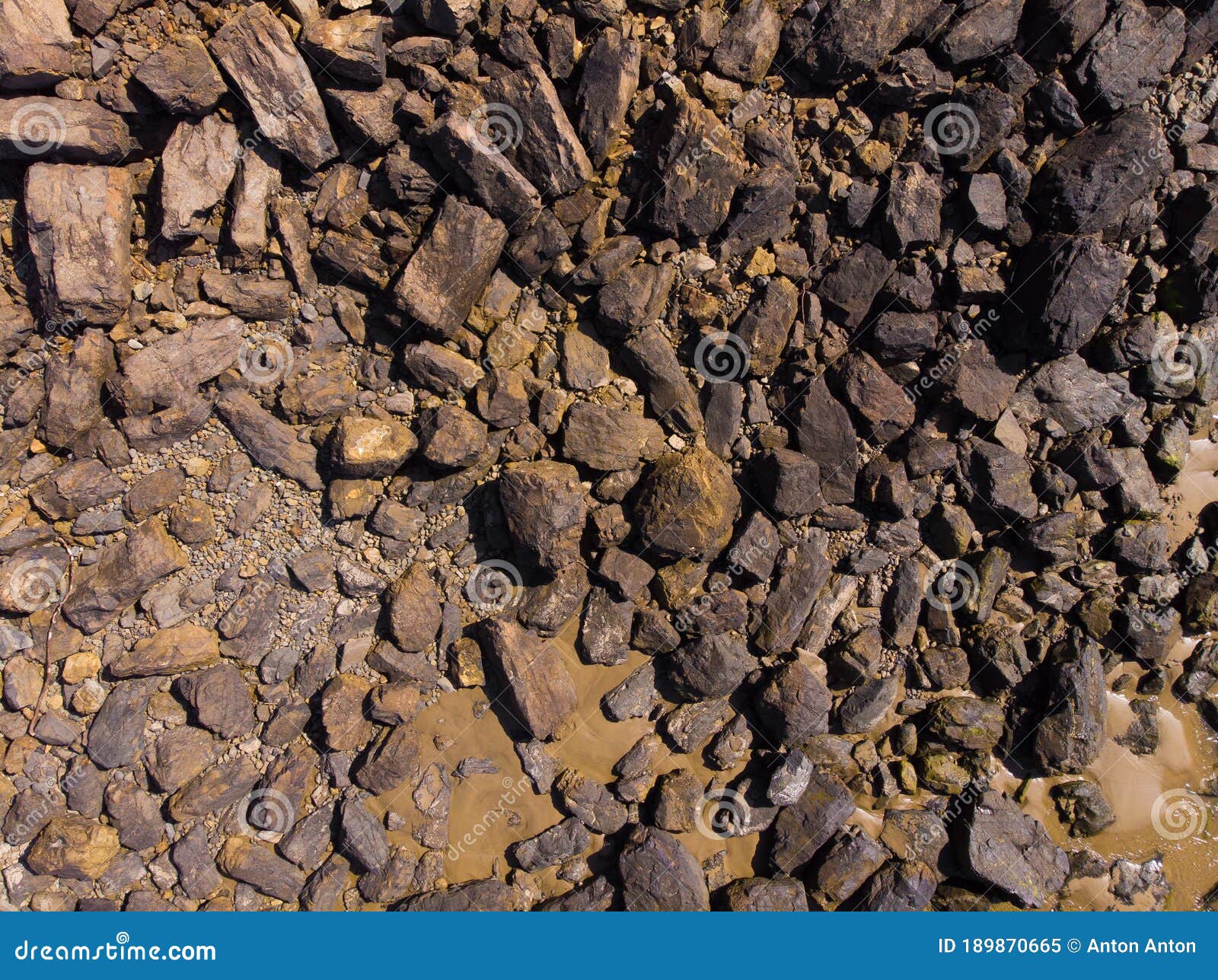 Rocks and Stones on the Beach, Top View, Texture and Background Stock ...