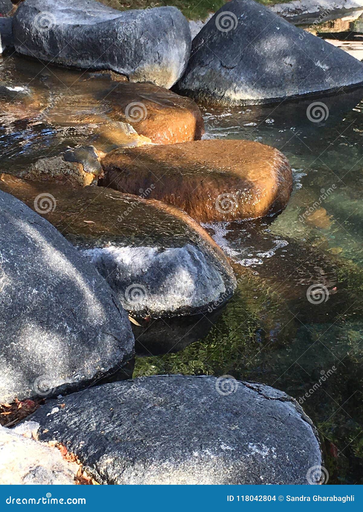 Rocks in Stream stock photo. Image of colored, stream - 118042804