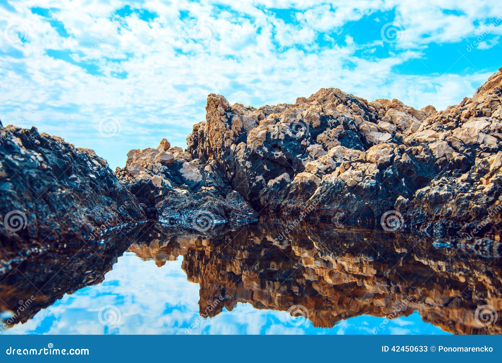 Rocks and Their Reflection in the Sea Stock Image - Image of luxury ...