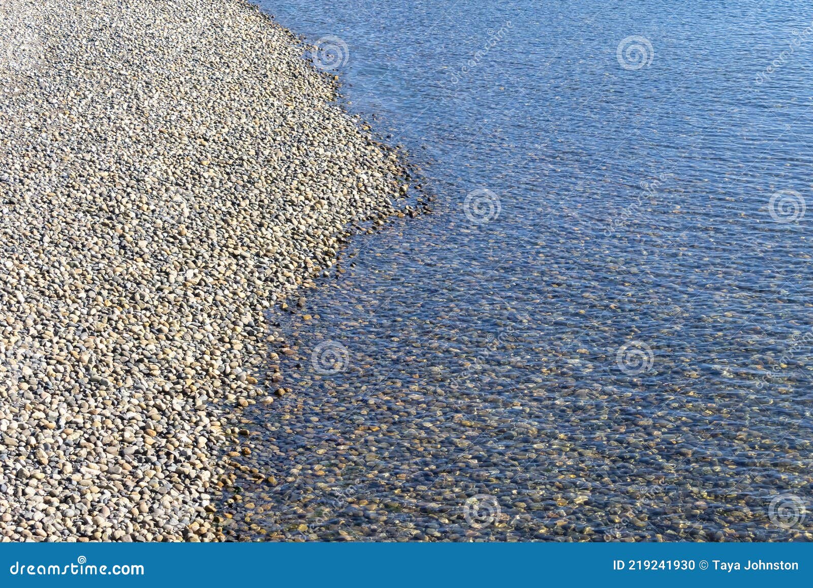 Rocks Under the Shallow Water on a Beach Stock Photo - Image of ...