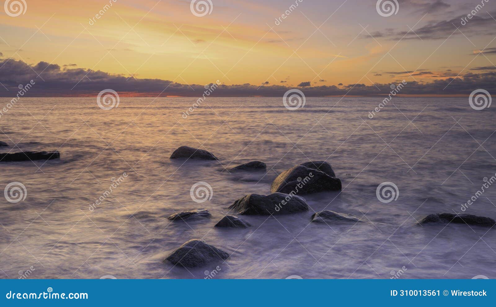 Rocks on the Water with a Sunset Backdrop Stock Image - Image of nature ...