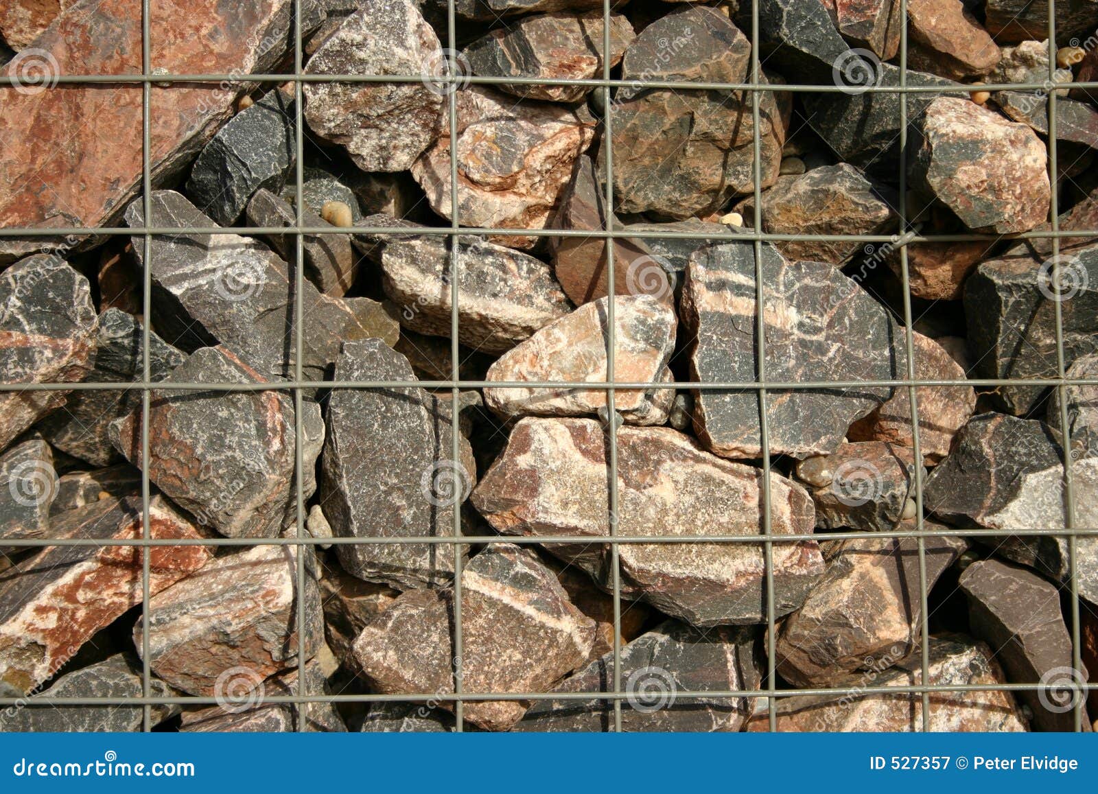 Rocks in wire stock image. Image of rectangular, rocky - 527357