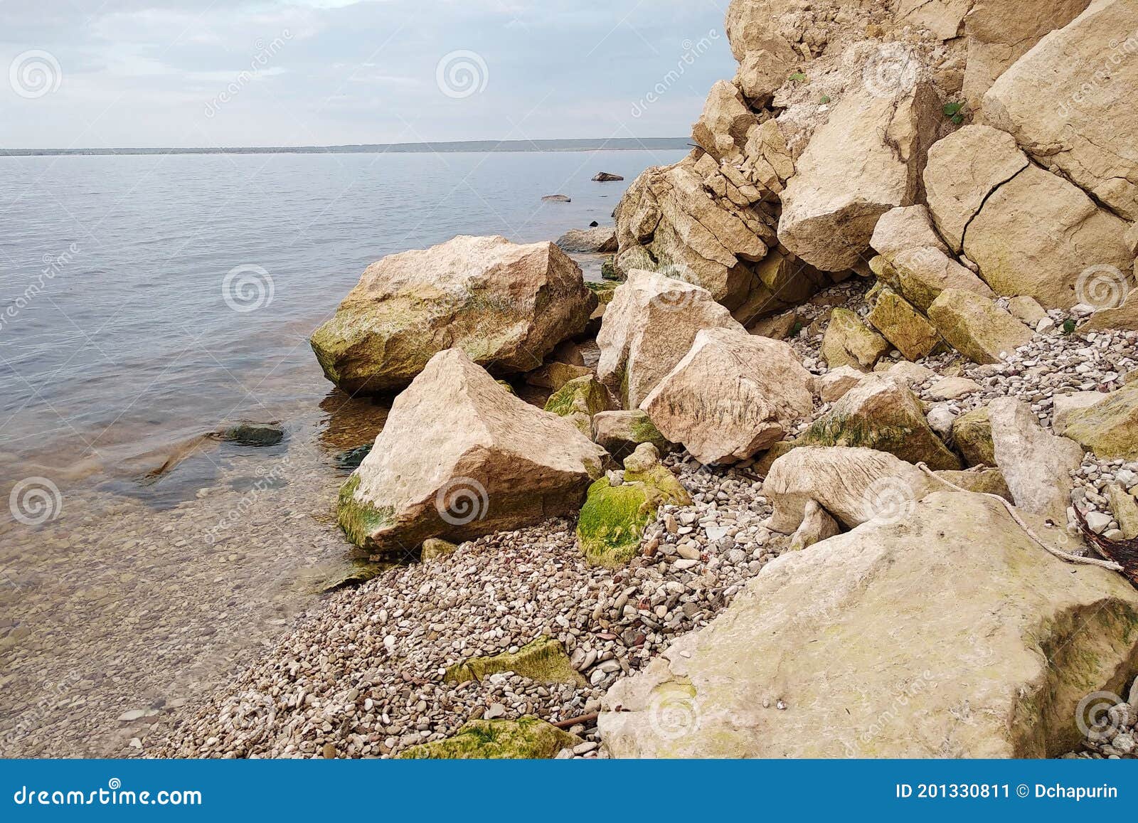 Rocky bank by the river stock image. Image of riverbank - 201330811