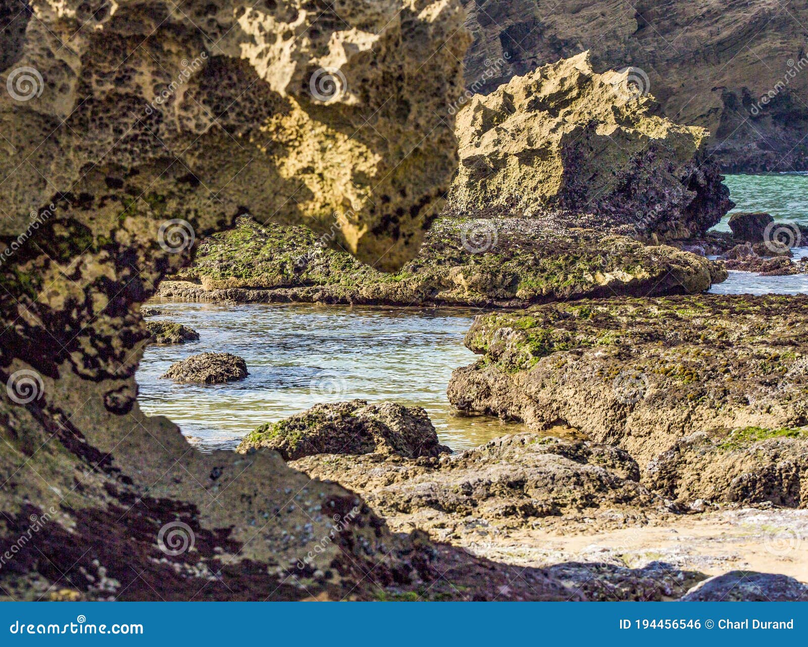 Rocky Beach with Craggy Cliffs Stock Photo - Image of cirrus, saltwater ...