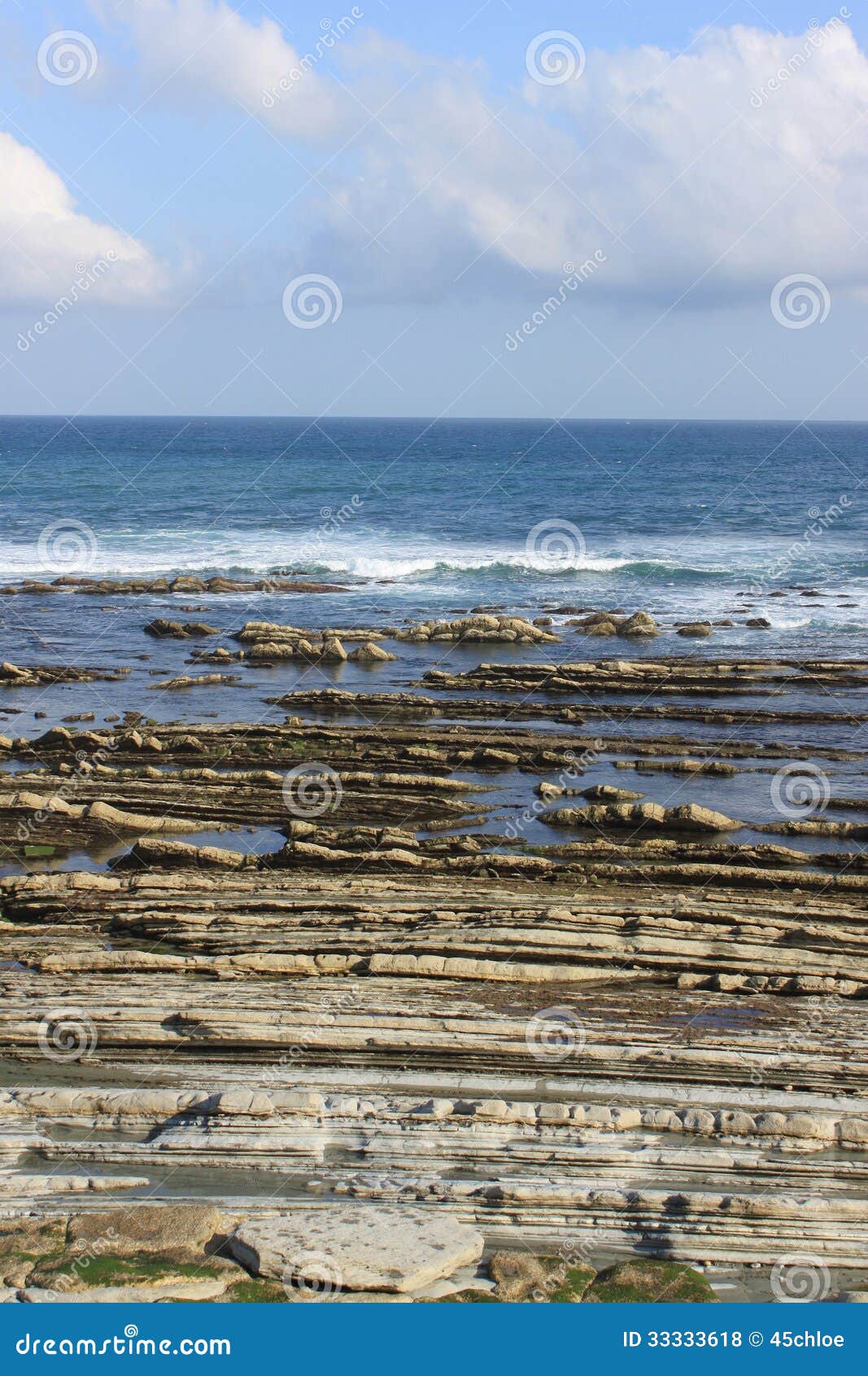 Rocky beach at low tide stock photo. Image of cliff, wild - 33333618