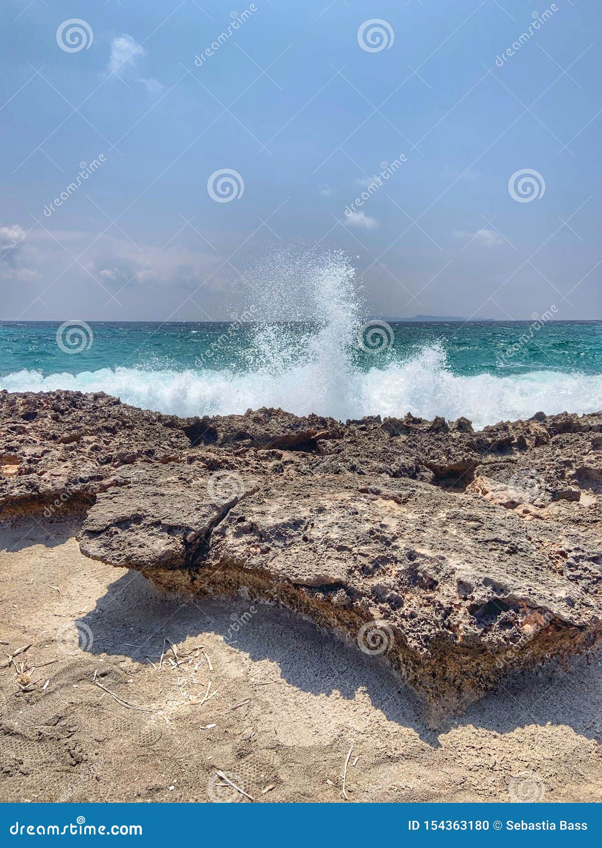 Rocky Beach in Mallorca, in Summer at High Tide with the Waves Hitting ...