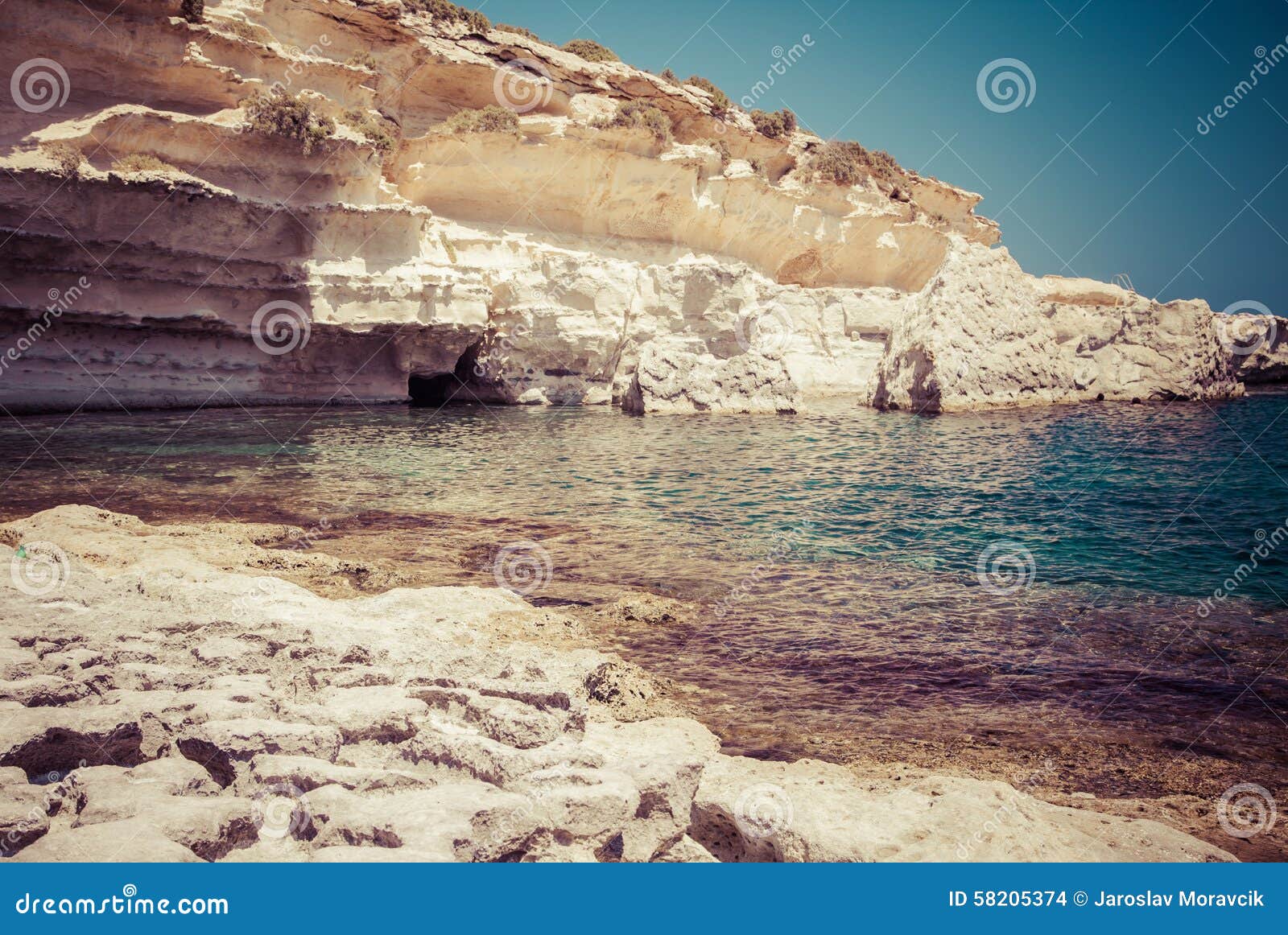 Rocky beach in Malta stock photo. Image of blue, pool - 58205374