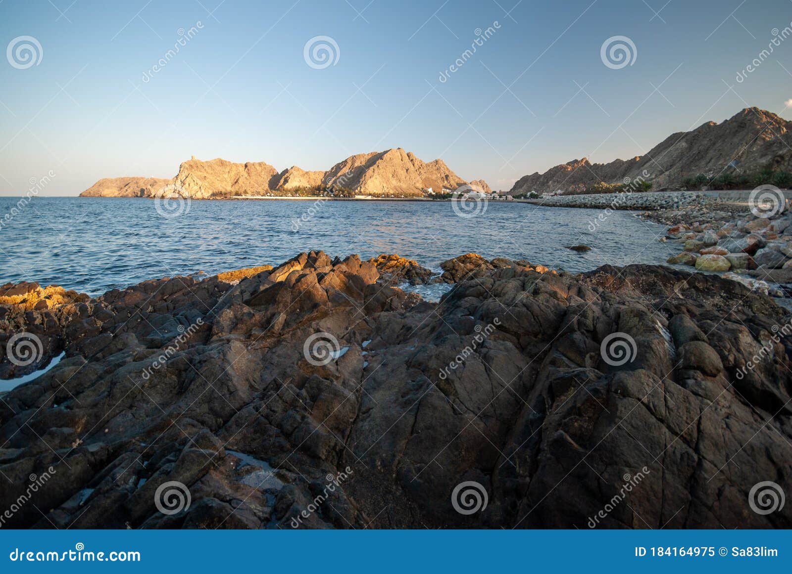 Rocky beach Muscat stock image. Image of nature, travel - 184164975