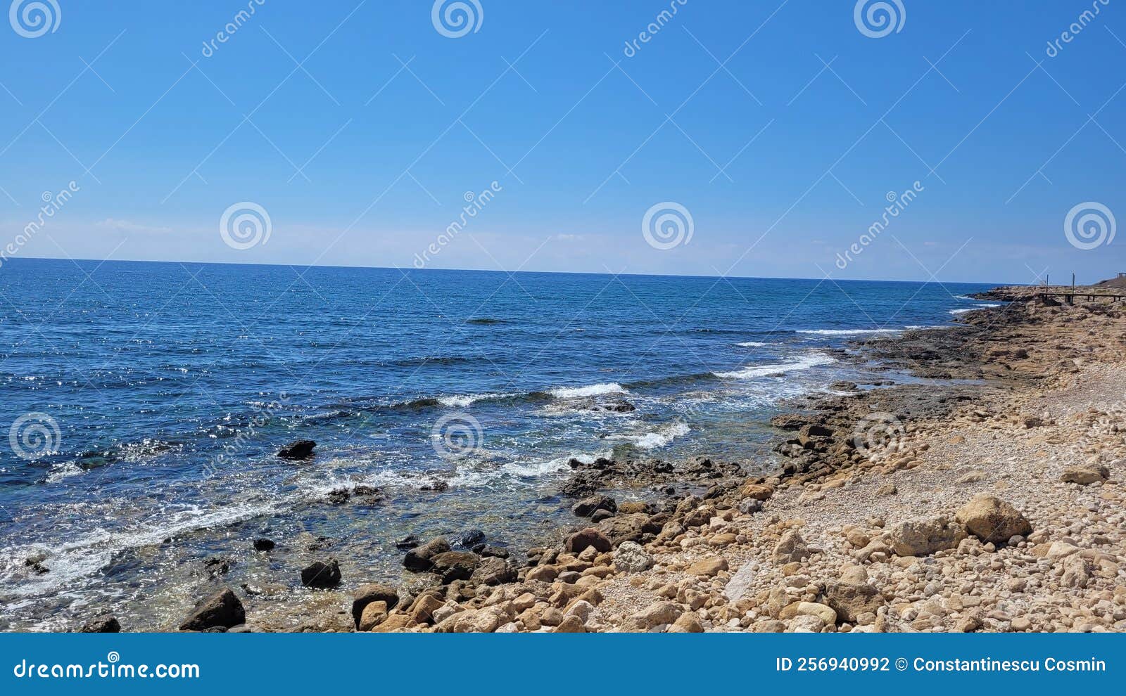 Rocky beach of Paphos stock photo. Image of shore, cove - 256940992