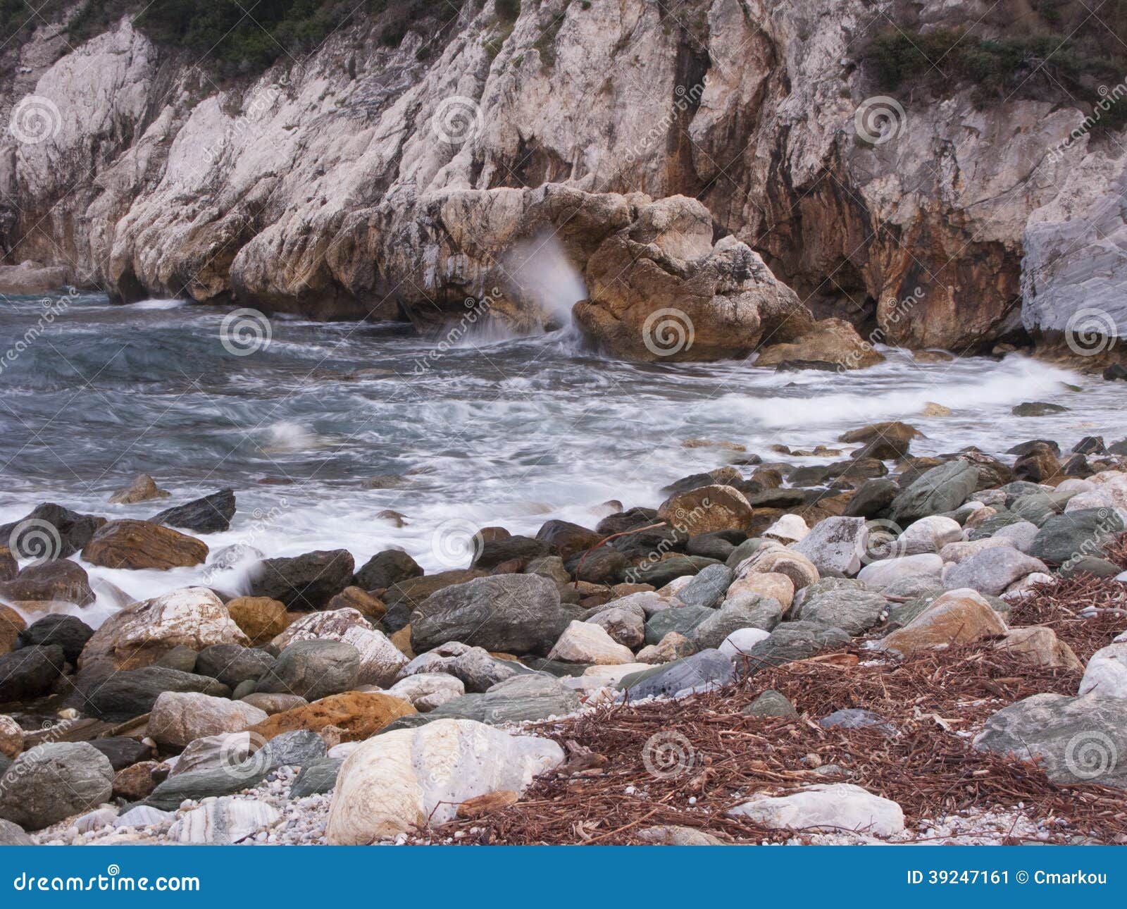 Rocky beach stock image. Image of beach, foam, rocks - 39247161