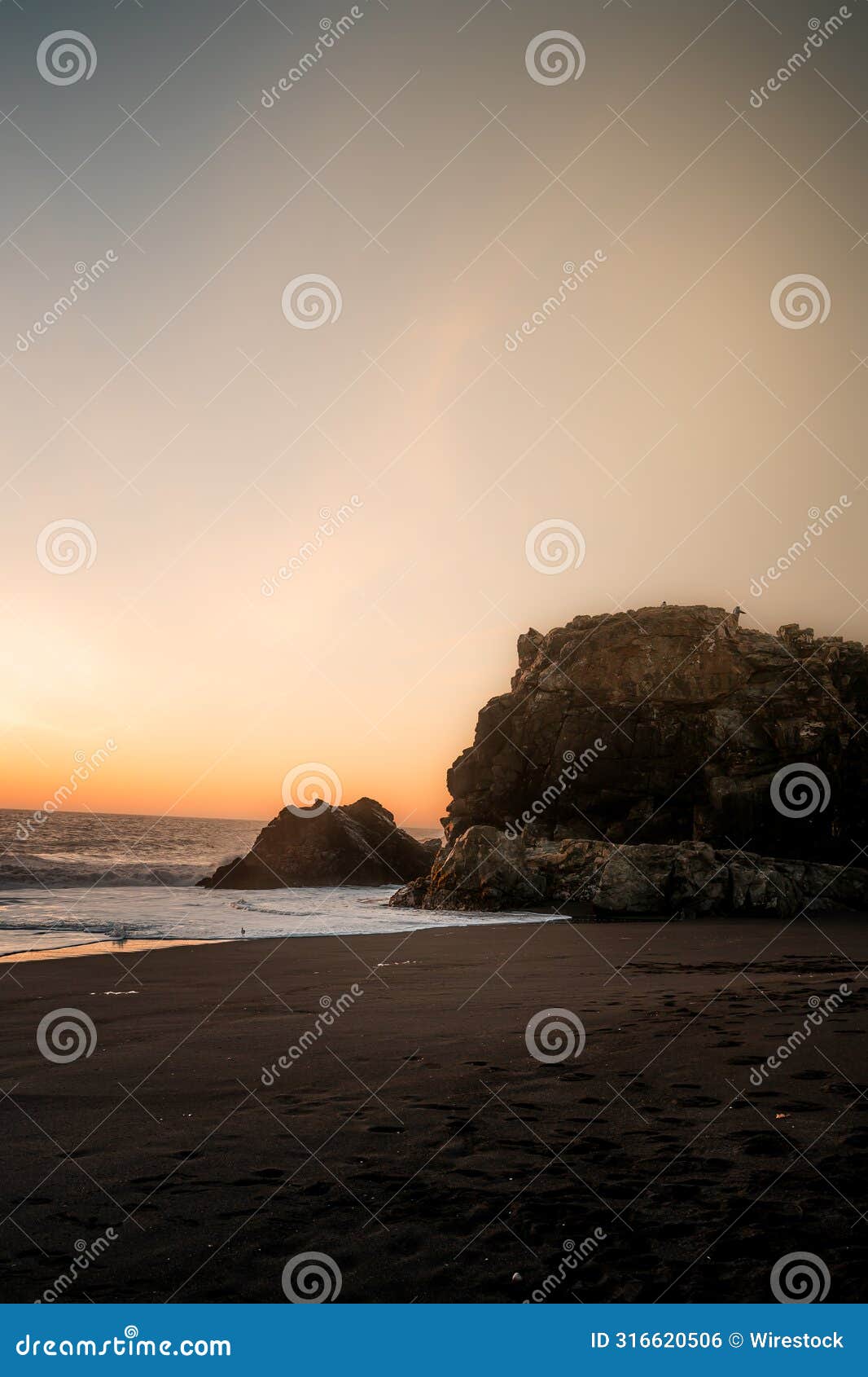 Rocky Beach at Sunset with Colorful Sky Stock Photo - Image of scenic ...