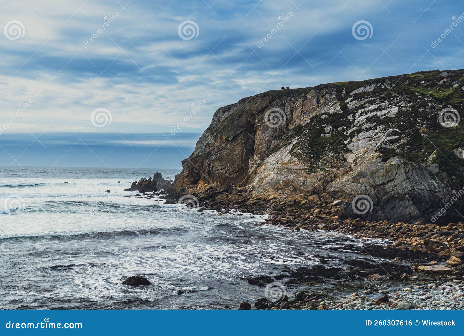 Rocky Cliff in the Ocean with Blue Sky Stock Photo - Image of outdoor ...