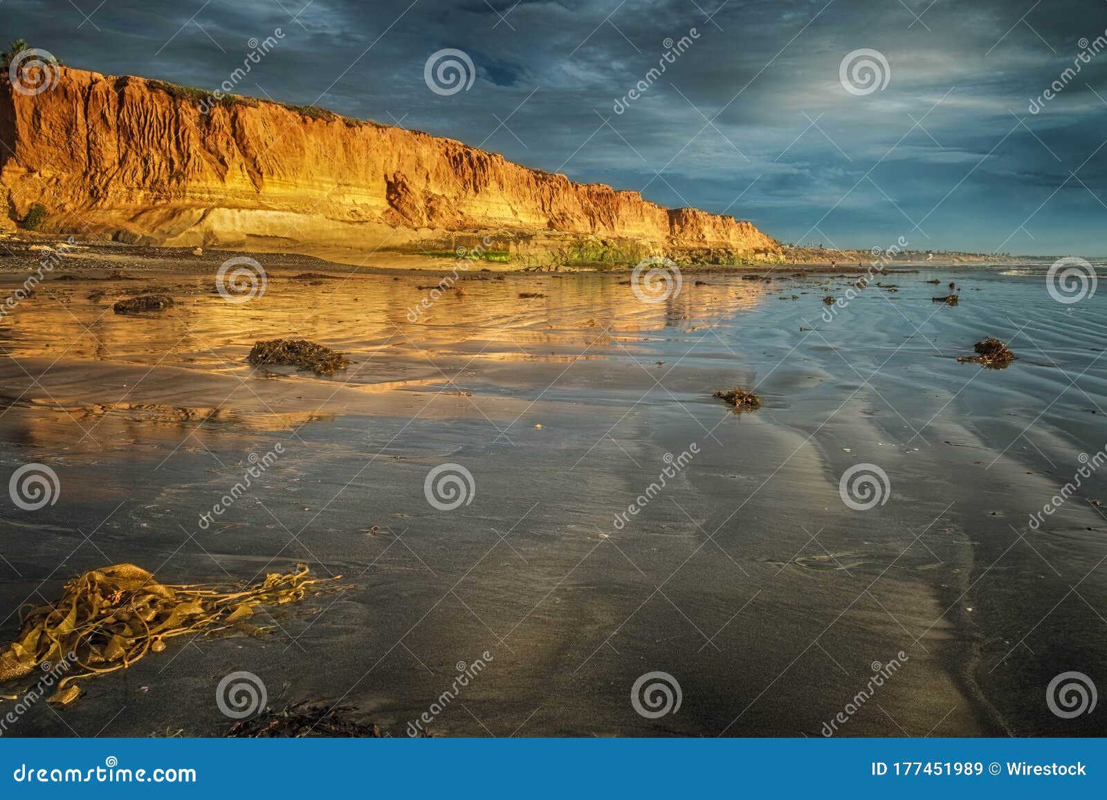 Rocky Cliff on the Seashore Under the Beautiful Storm Clouds Stock ...