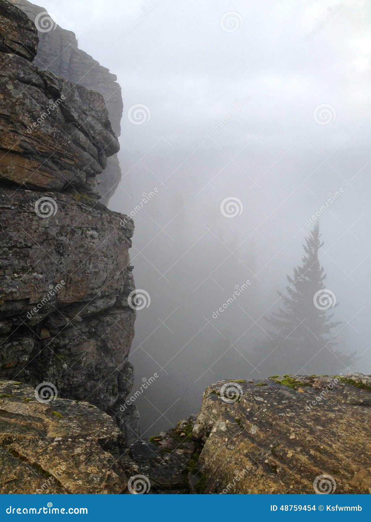 A Rocky Cliff With A Layered Structure Of Sedimentary Rocks Stock ...
