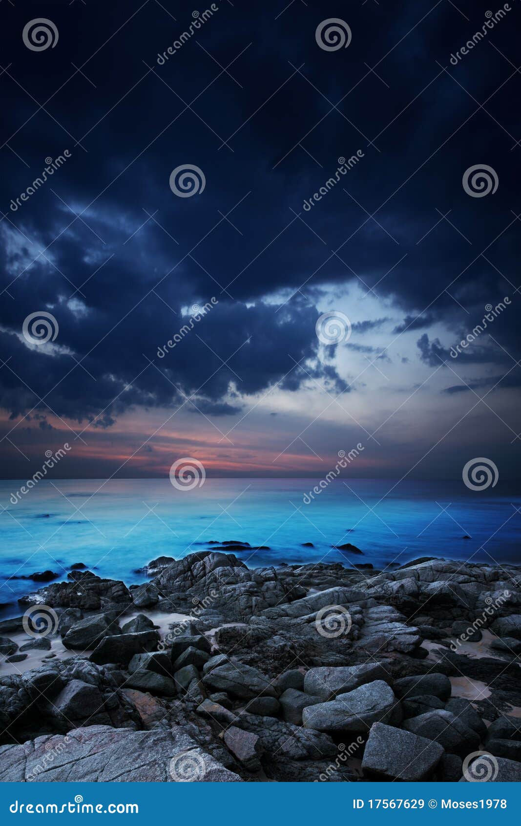 Rocky coast at night stock image. Image of beach, dark - 17567629