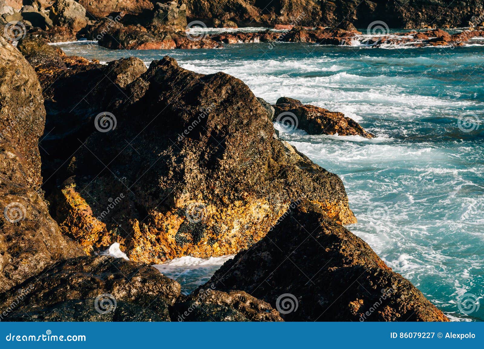 Rocky Coastline and Turquoise Colored Ocean Waves Stock Image - Image ...