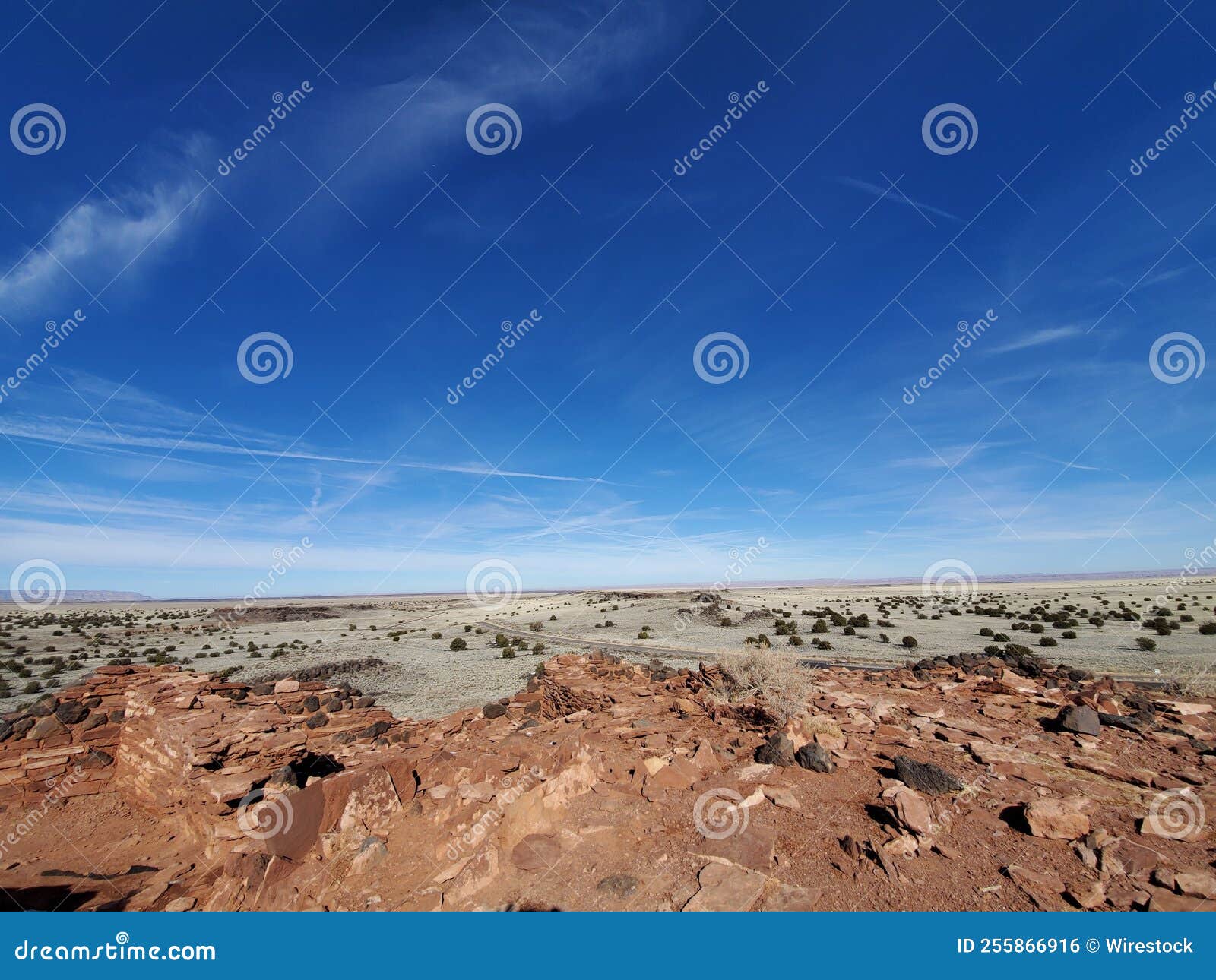 Rocky Desert Landscape Under a Clear Blue Sky Stock Photo - Image of ...