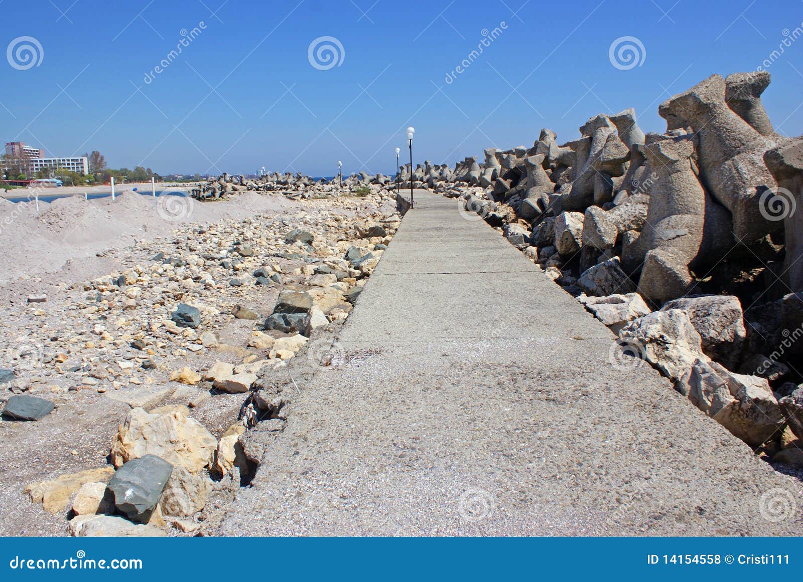 Rocky Embankment Near Beach Stock Photo - Image of clouds, jetty: 14154558