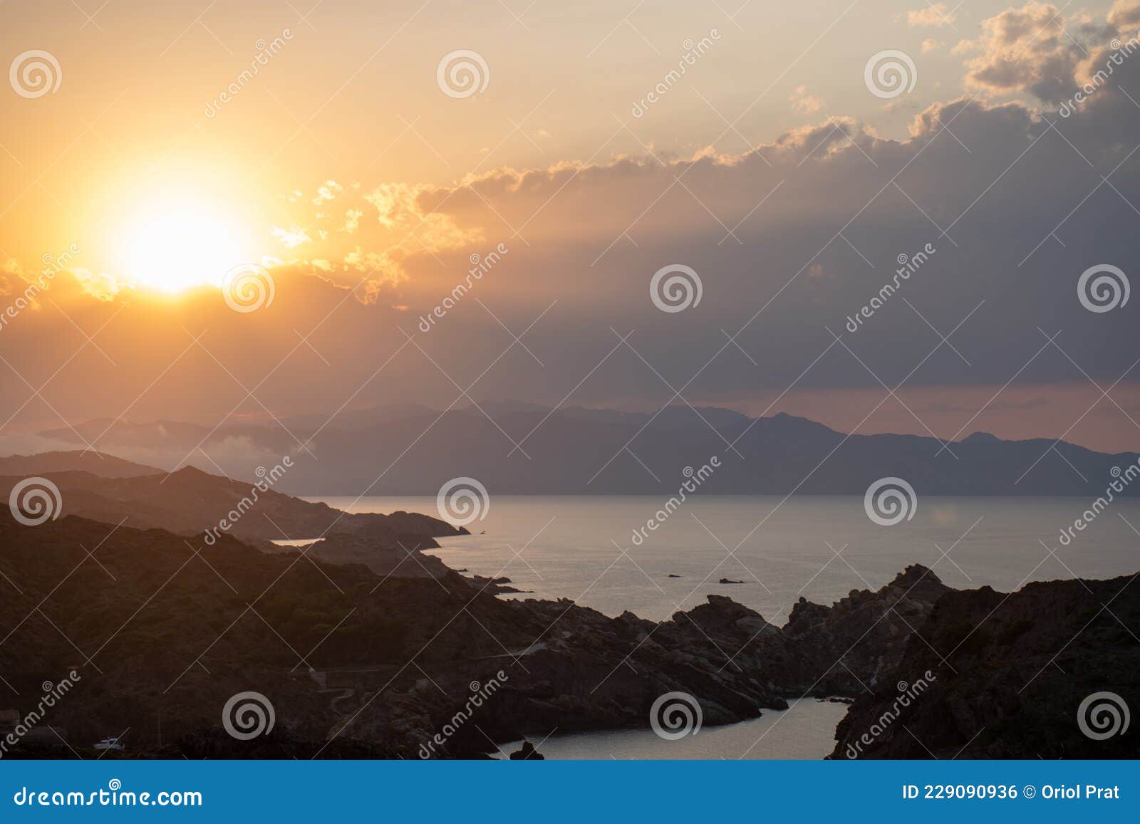 Rocky Landscape by the Sea during a Sunset Stock Photo - Image of dusk ...