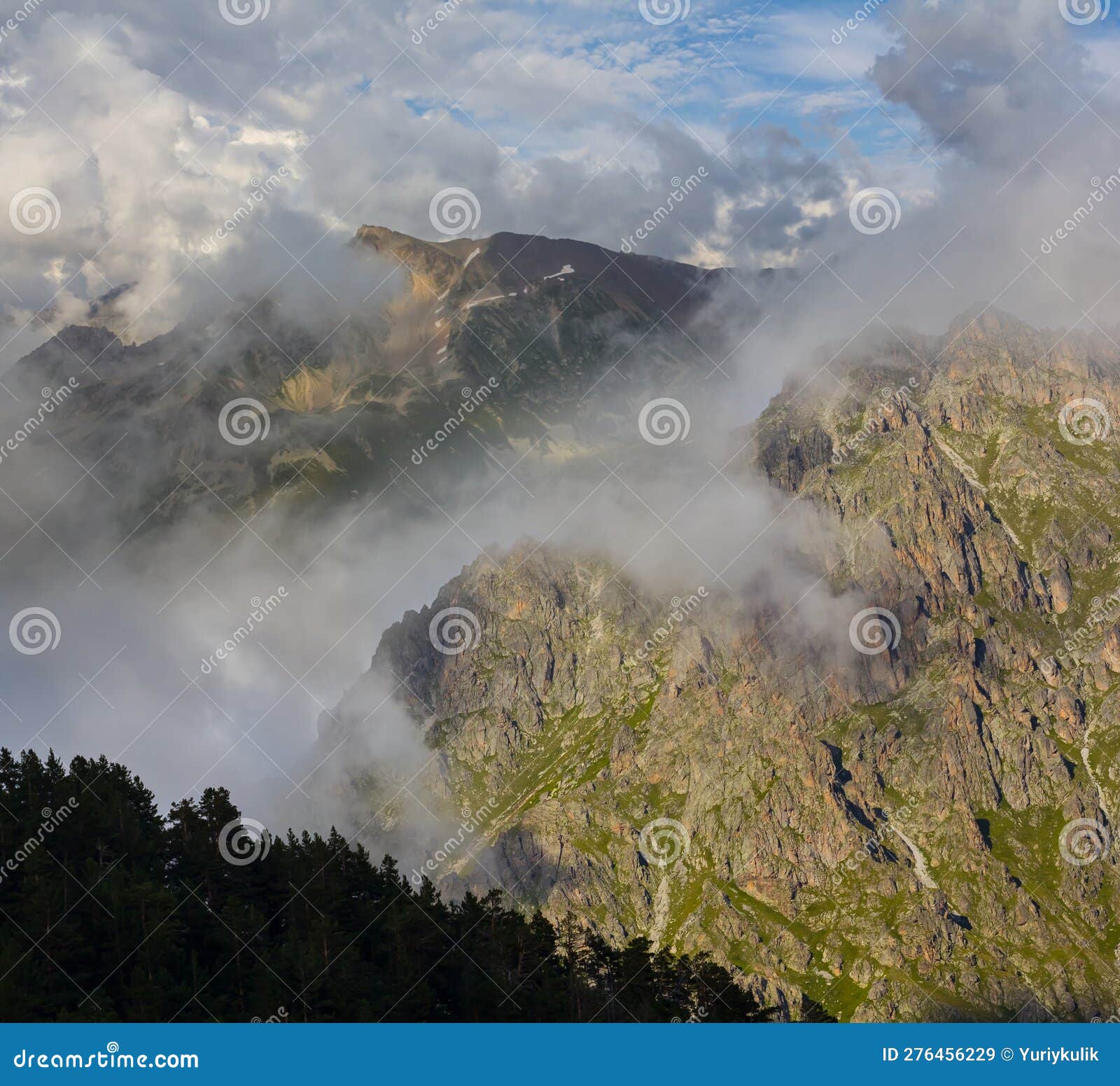 Rocky Mountain Chain in Dense Clouds Stock Image - Image of mountain ...