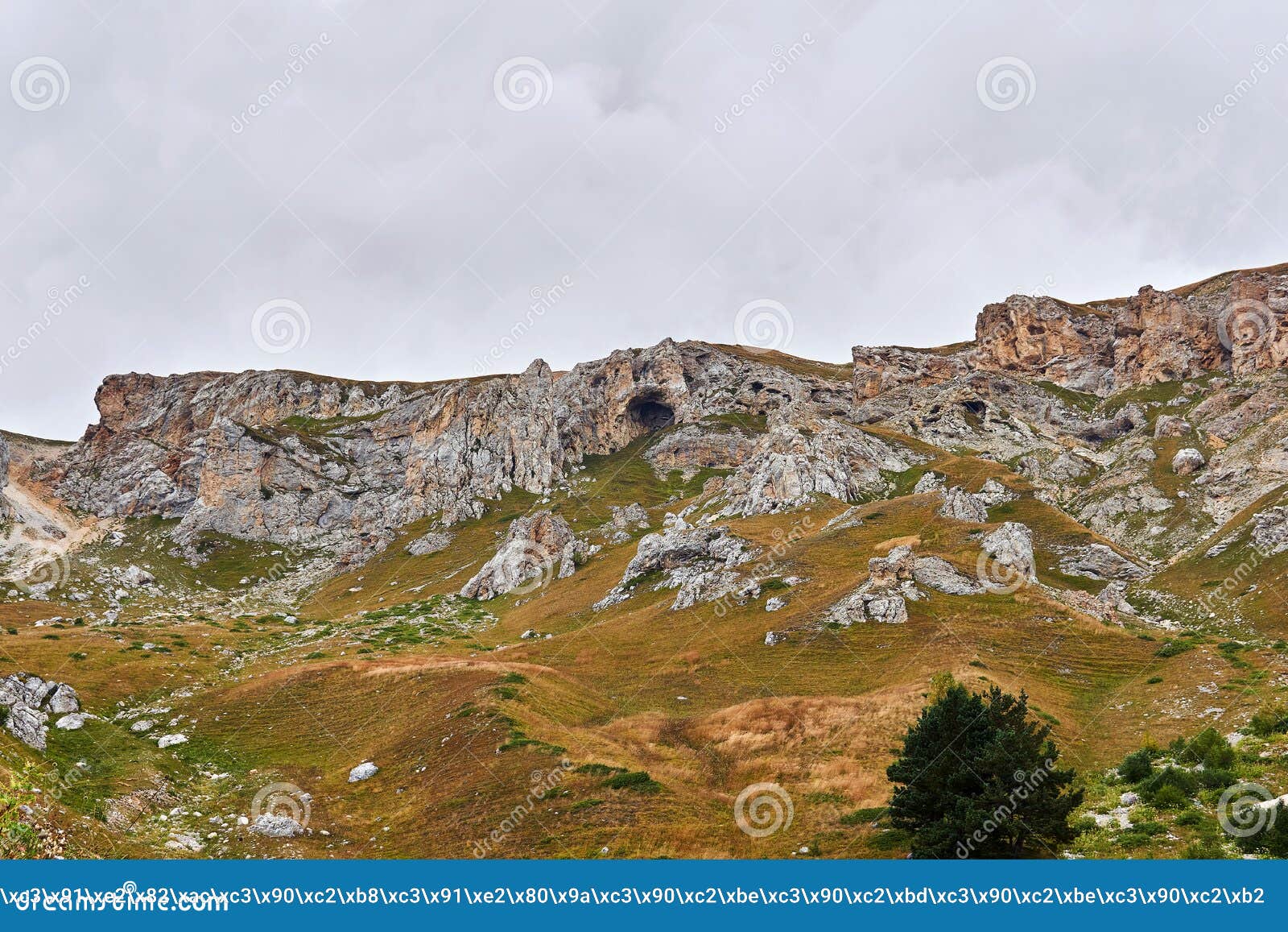 Rocky Ridge with a Cave in the Highlands Stock Image - Image of rocky ...