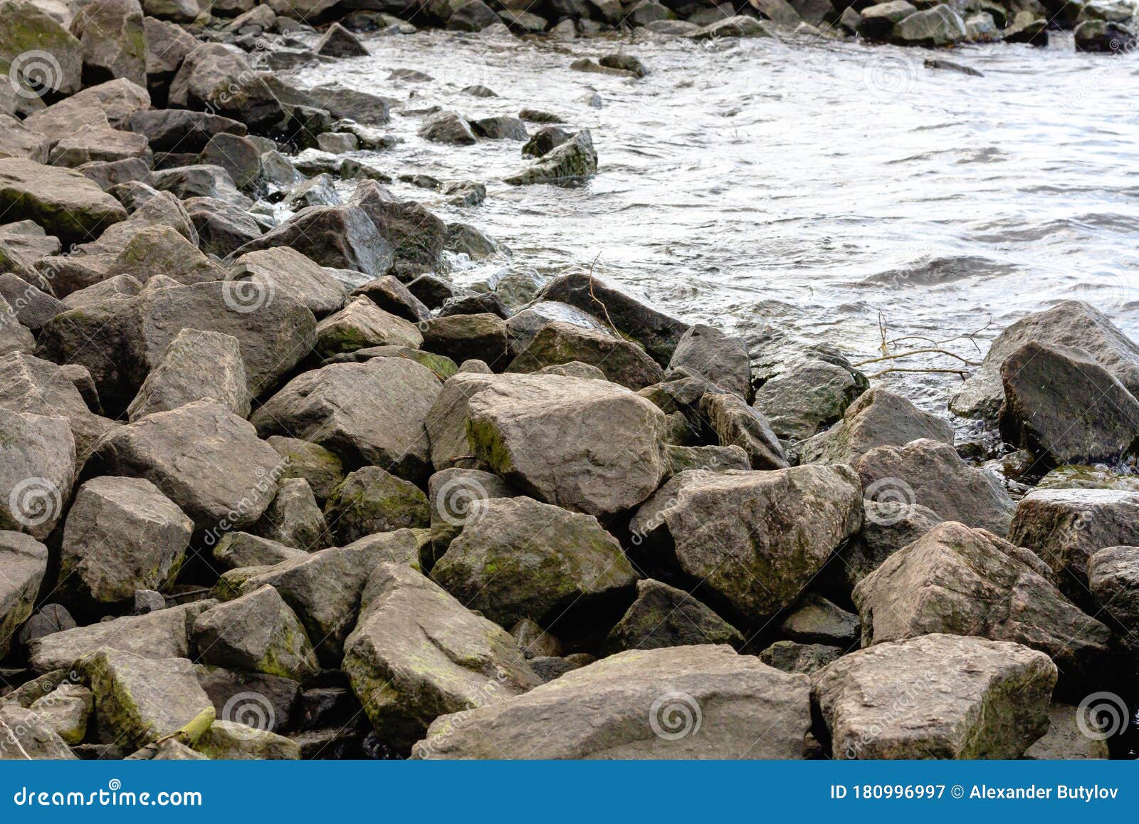 Rocky Riverbank. Waves Rise Against Rocks Stock Image - Image of water ...