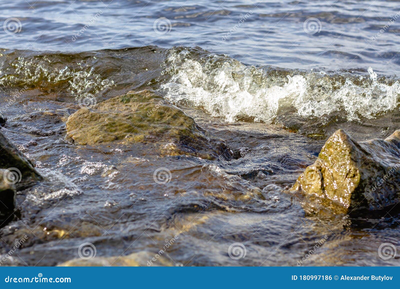 Rocky Riverbank. Waves Rise Against Rocks Stock Photo - Image of rise ...