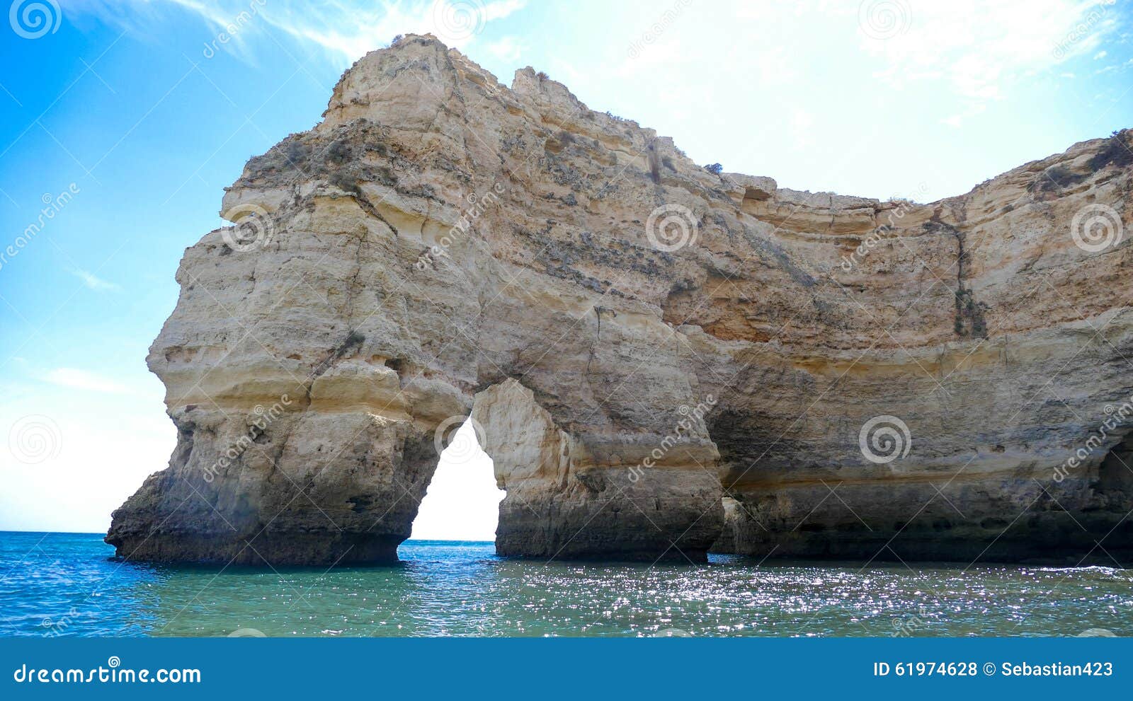 Rocky sandstone cliff stock photo. Image of ocean, lagoon - 61974628
