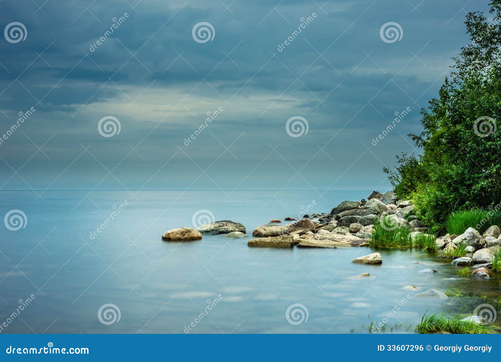 Rocky Shore, Long Shutter Shoot Stock Photo - Image of landscape, cloud ...