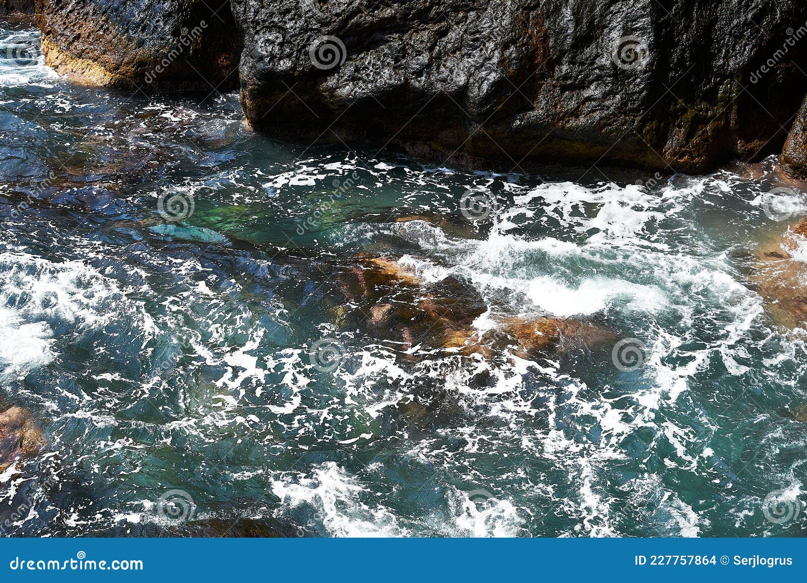 Rocky shore. Tidal bore stock photo. Image of ocean - 227757864