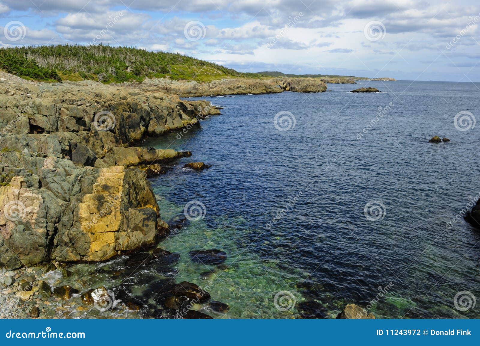Rocky Shoreline stock photo. Image of clouds, canadian - 11243972