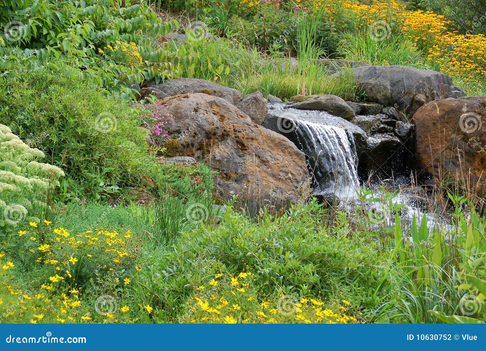 Rocky waterfall stock photo. Image of long, rock, garden - 10630752