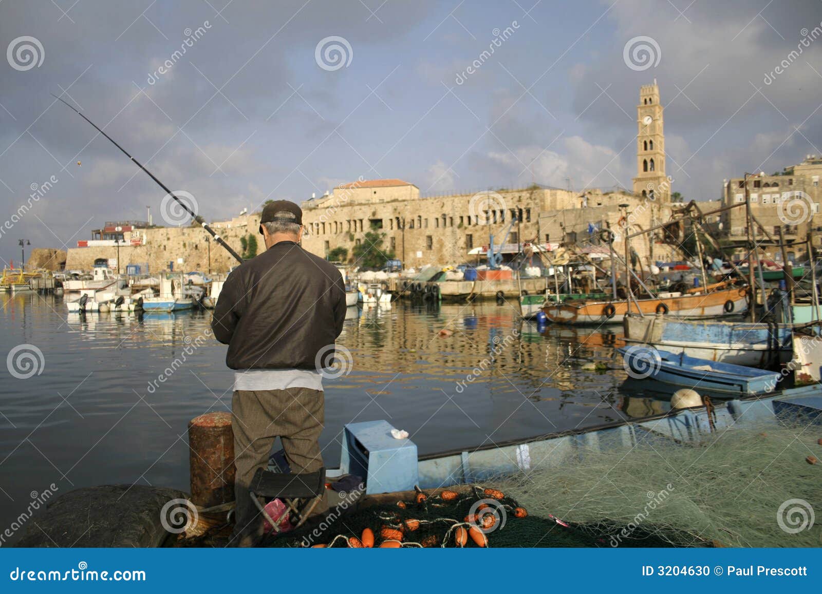 Rod fisherman in akko stock photo. Image of port, picturesque - 3204630