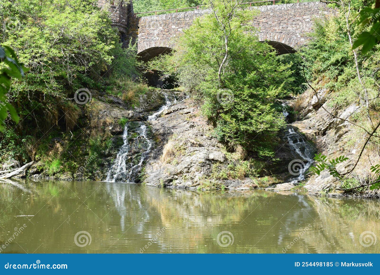 Roes, Germany - 08 16 2022: Elz Waterfall Under a Bridge with Two Tiny ...
