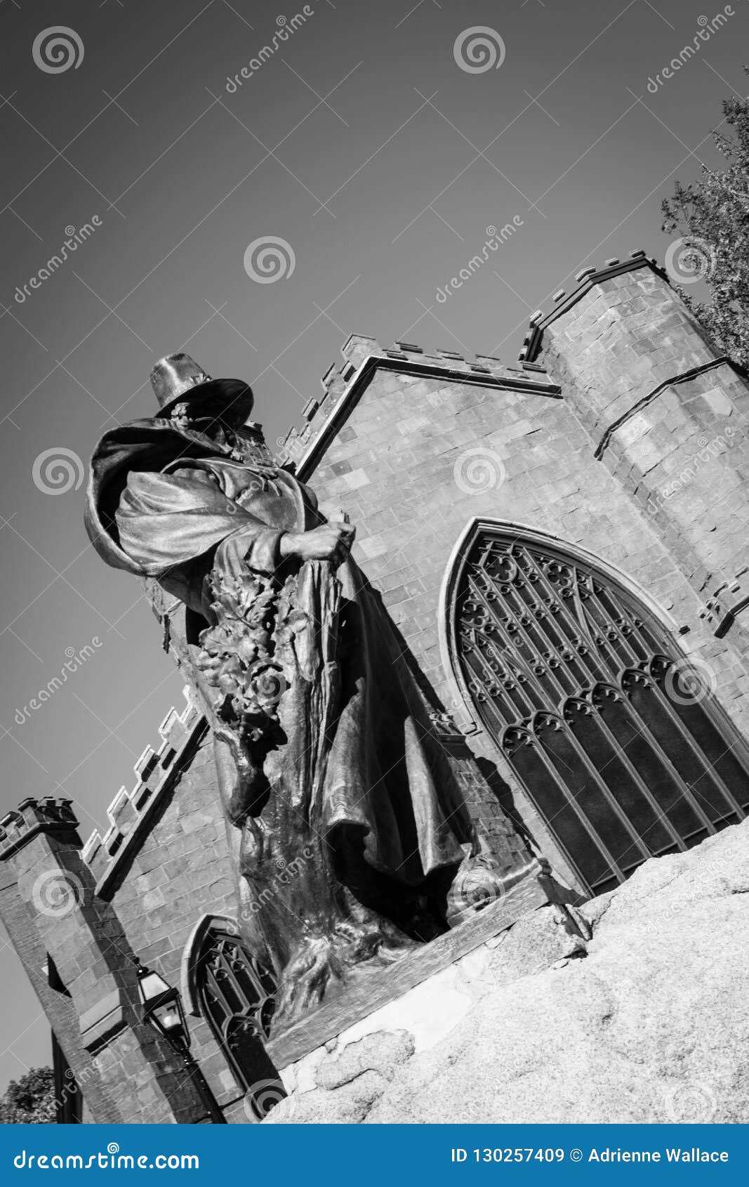 Roger Conant Statue with Salem Witch Museum in Background Stock Image ...