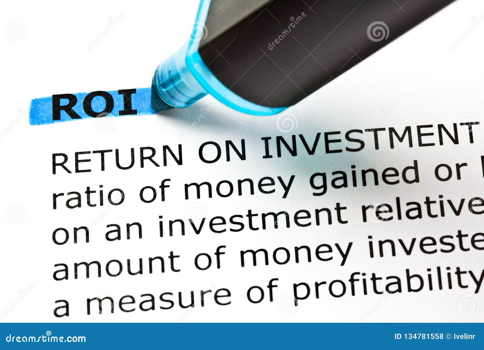 ROI Return on Investment Highlighted with Blue Marker Stock Photo ...