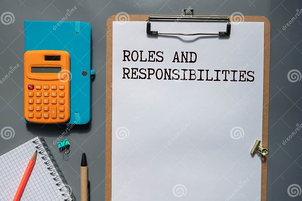 Roles and Responsibilities Write on Paperwork Isolated on Wooden Table ...