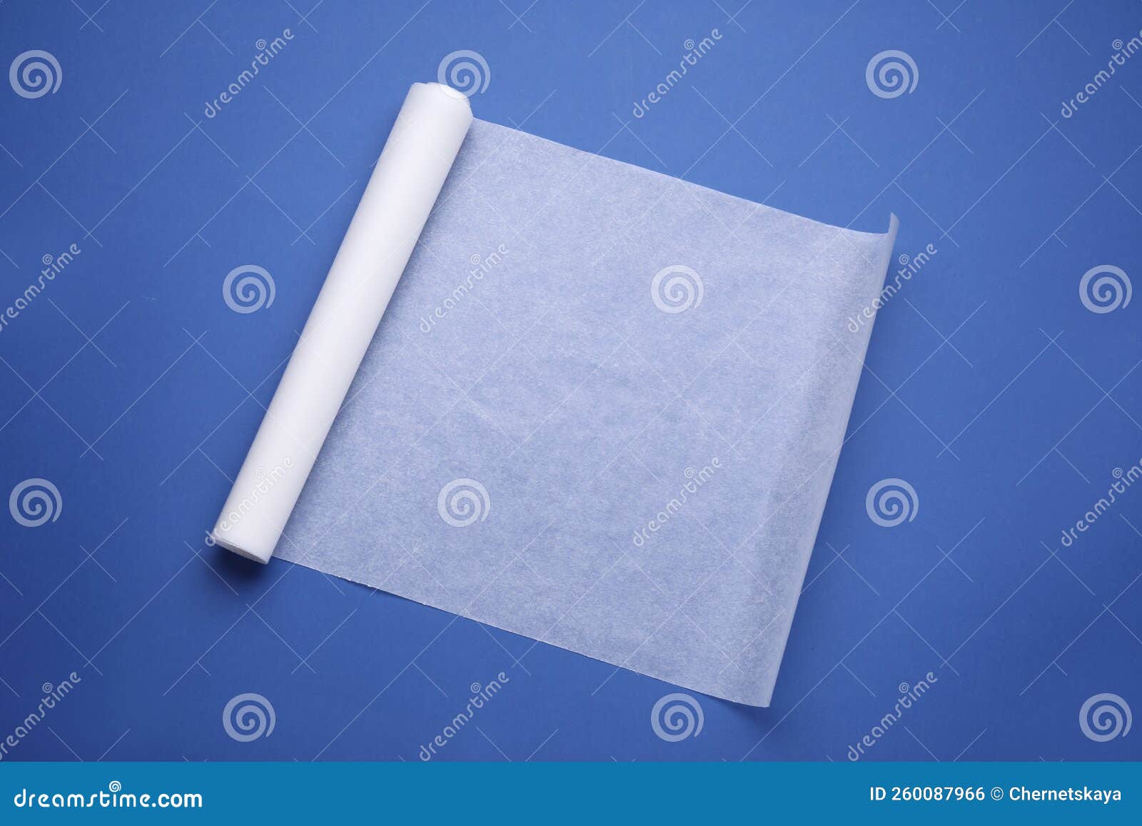 Roll of Baking Paper on Blue Background, Top View Stock Photo - Image ...