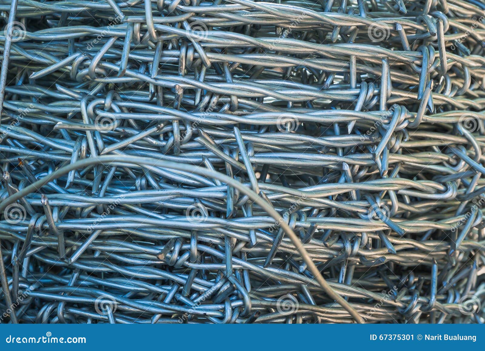 Roll of barb wire stock image. Image of metallic, shiny - 67375301