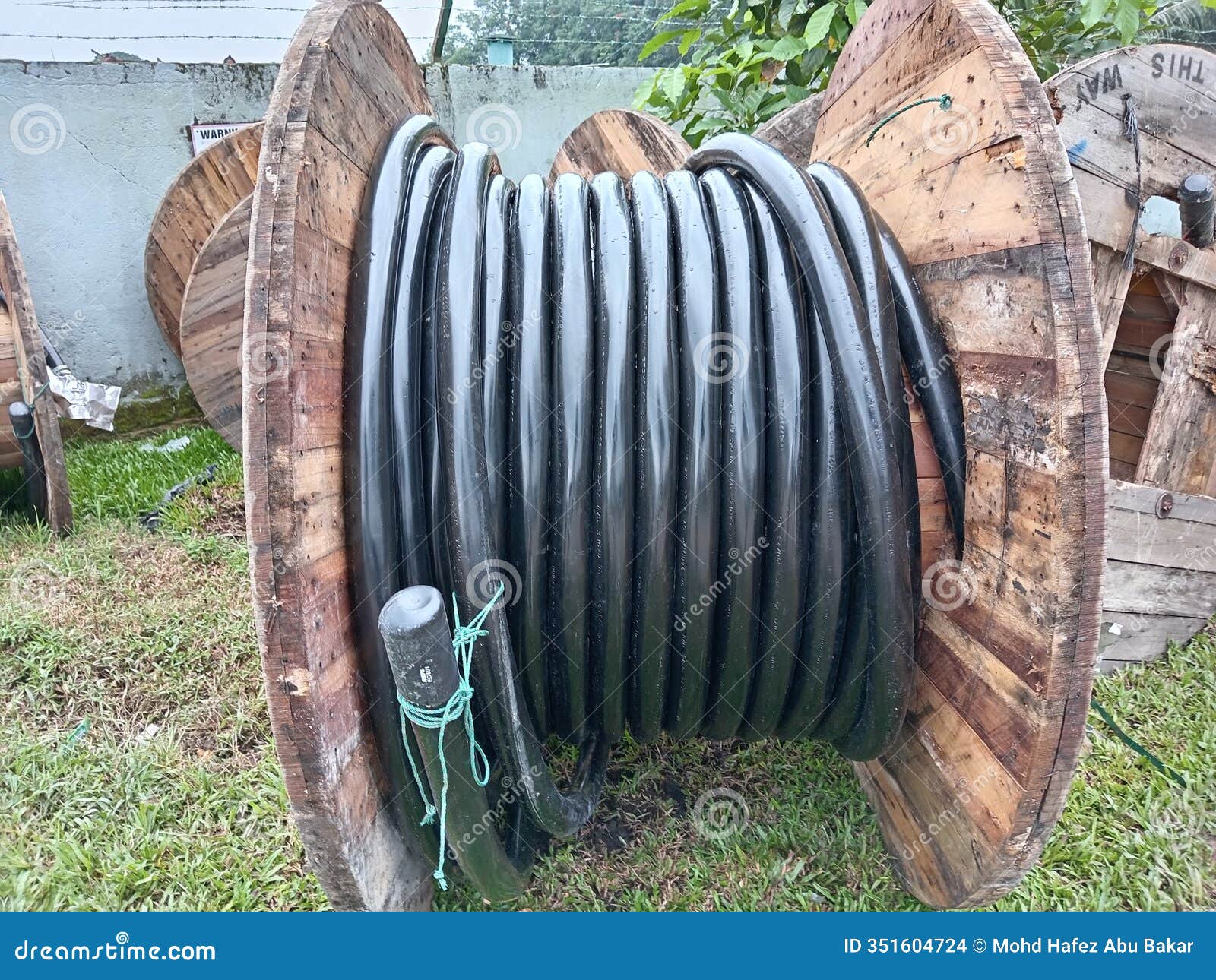Roll of Black Underground Electric Cables in the Working Site on the ...
