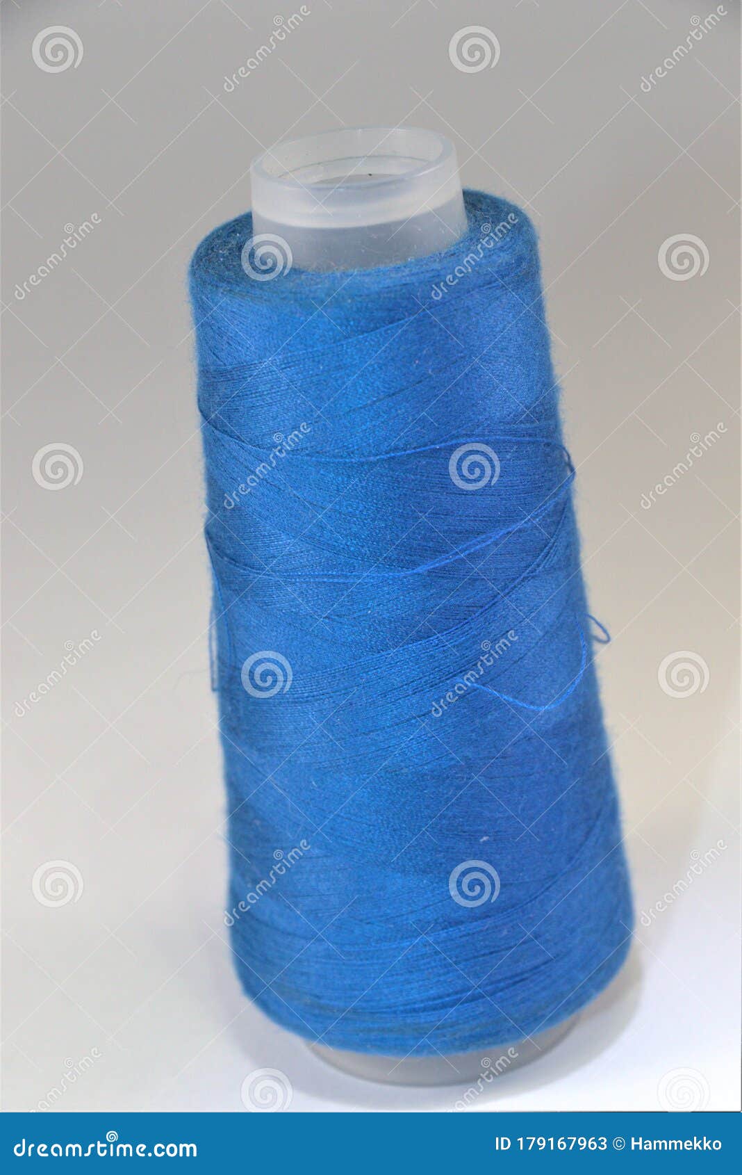 Roll of blue sewing thread stock image. Image of hobby - 179167963